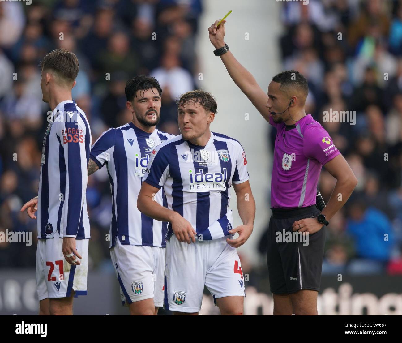 West Bromwich Albion's Callum Styles (centre) is shown a yellow card by ...