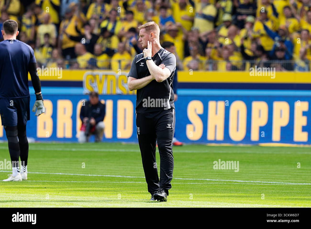Broendby's Assistant Coach Alan Tate during the Super League match ...