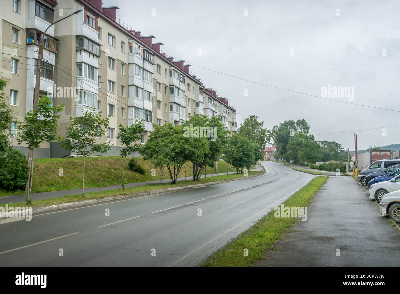 Street in Korsakov, Sakhalin Island, Russia, lined with Soviet-era ...