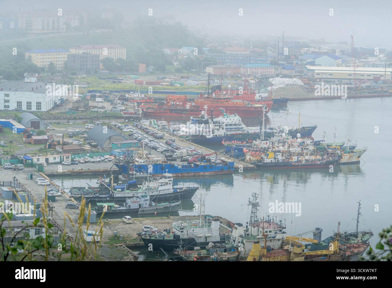 Cargo port with ships, cranes and containers in Korsakov, Sakhalin ...