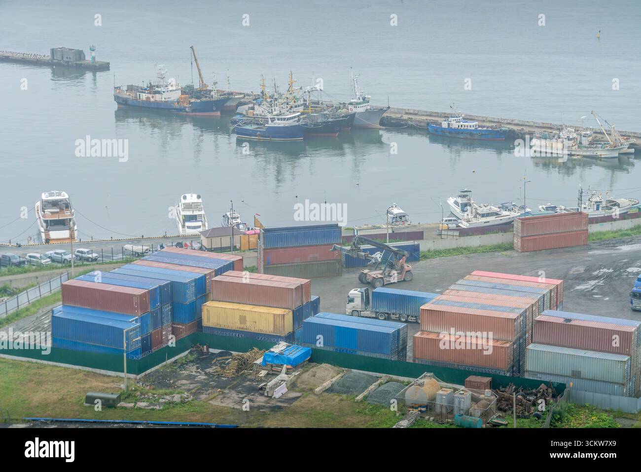 Port industry hub, Korsakov, Sakhalin Island, Russia, with cargo ...
