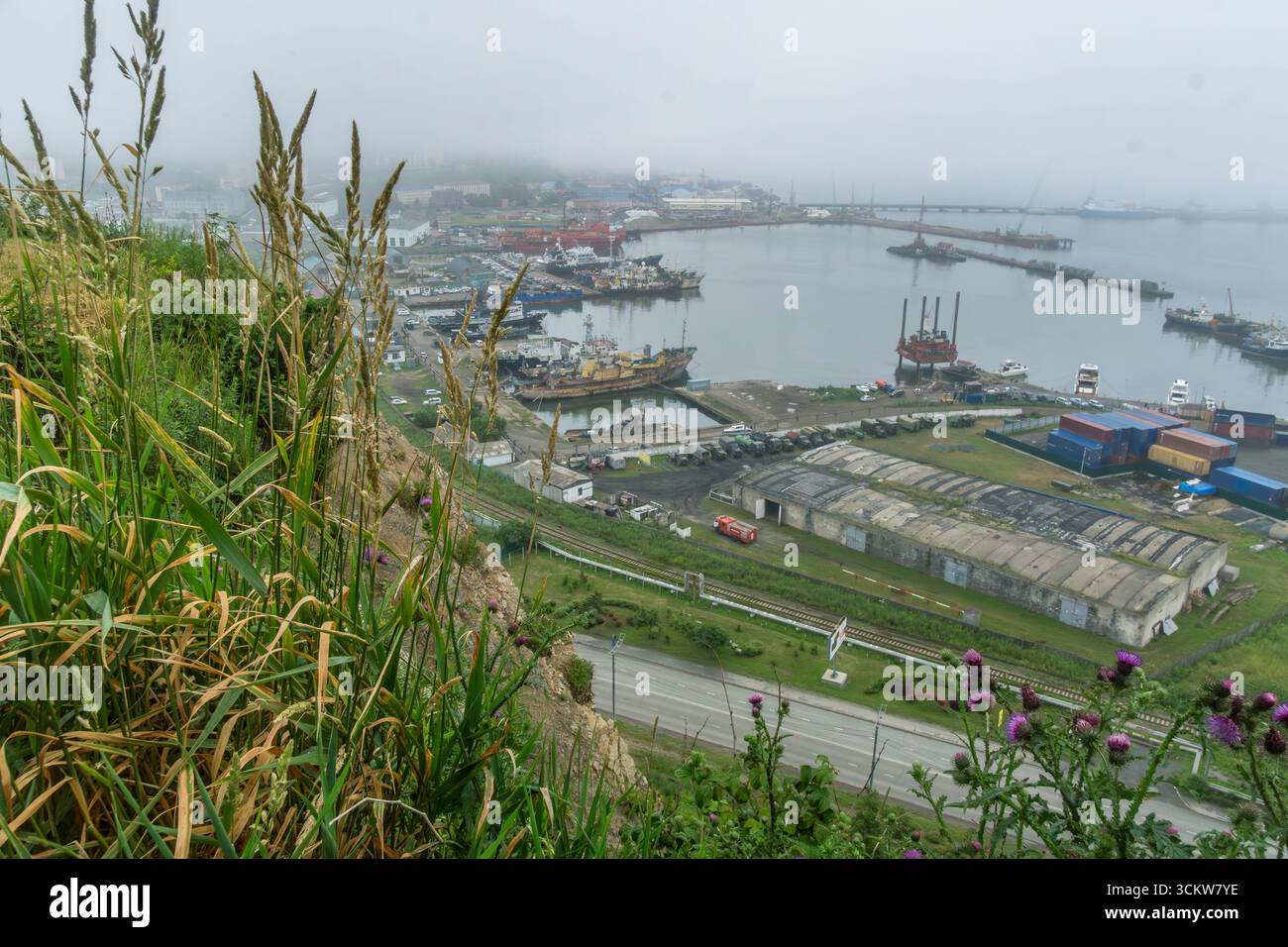 View of Korsakov port on Sakhalin Island, Russia, with cargo ships ...