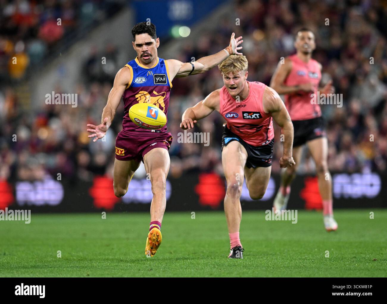Charlie Cameron (left) of the Lions in action during the AFL Semi-Final ...