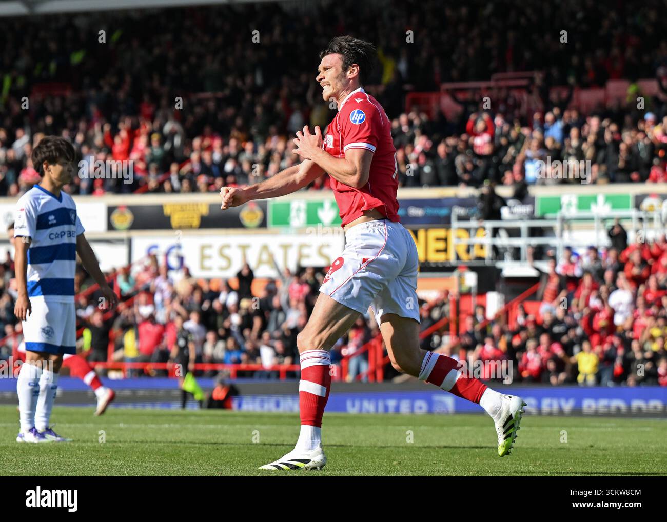 Wrexham's Kieffer Moore celebrates scoring his team's first goal during ...