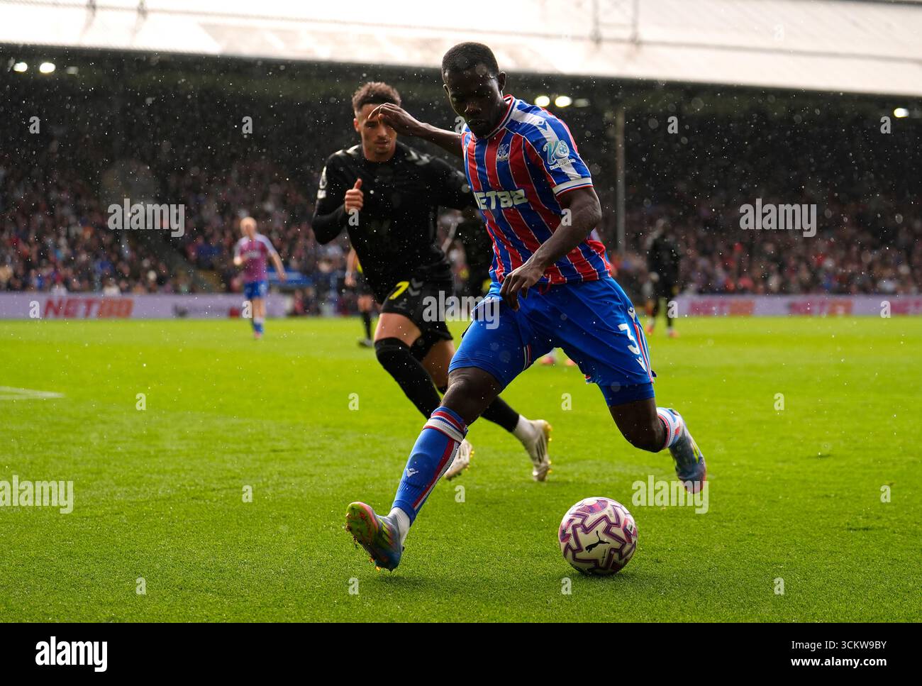 Crystal Palace's Tyrick Mitchell (right) in action during the Premier ...