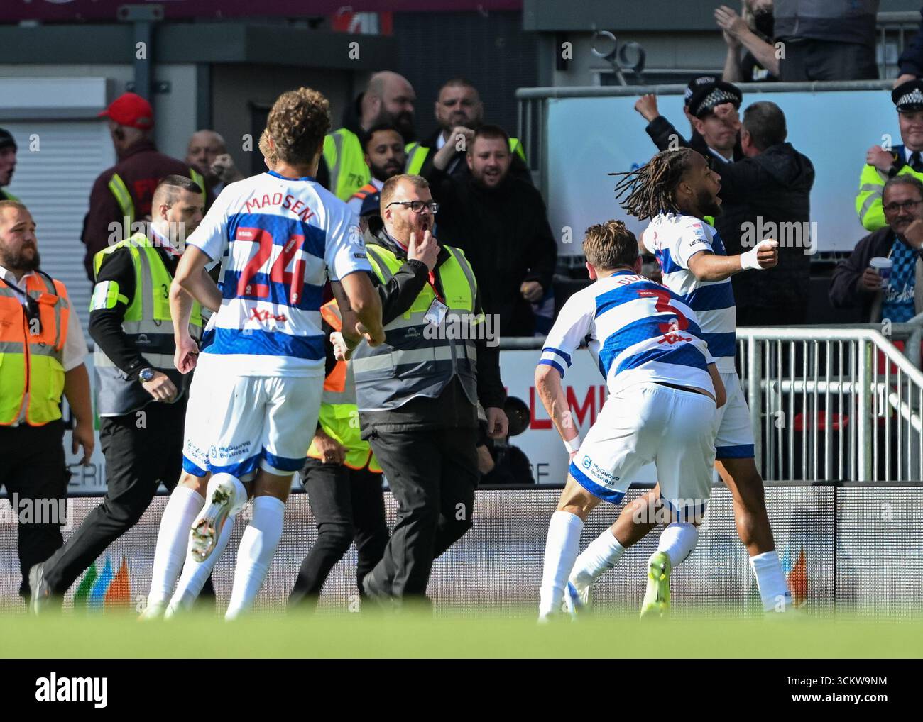 Queens Park Rangers' Rumarn Burrell (right) celebrates after scoring ...