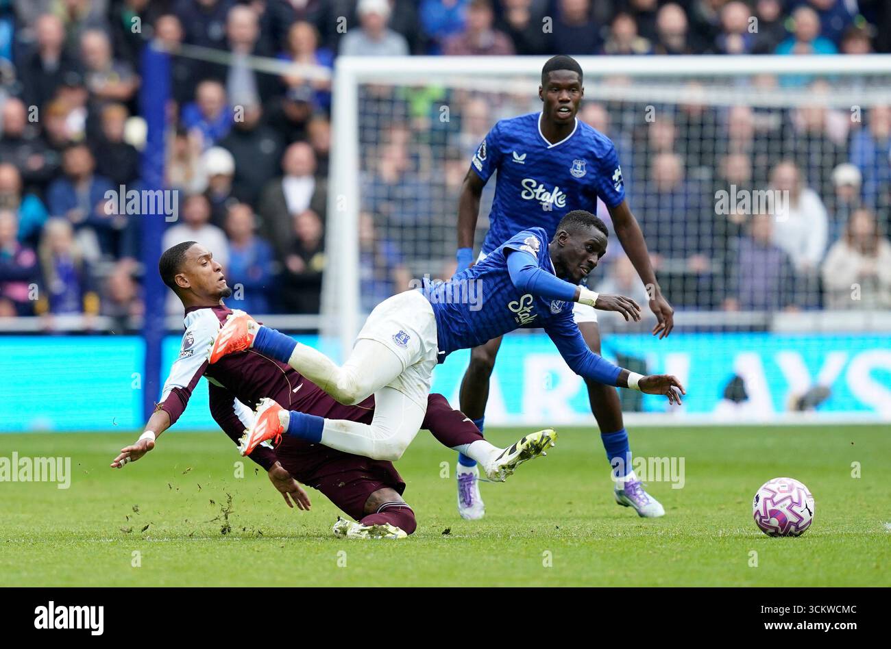 Liverpool, England, 13th September 2025. Ezri Konsa of Aston Villa (L ...