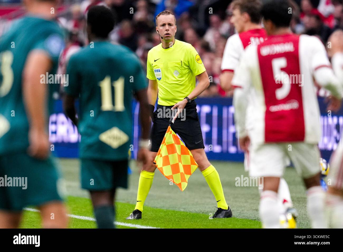 AMSTERDAM, NETHERLANDS - SEPTEMBER 13: Assistant Referee Stefan de ...