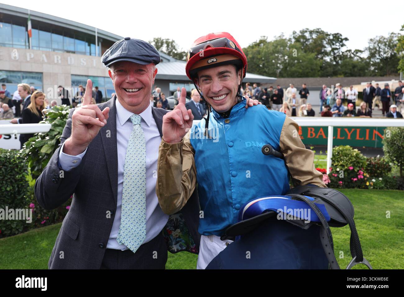 Trainer Karl Burke (left) with Jockey James Doyle after riding Fallen ...