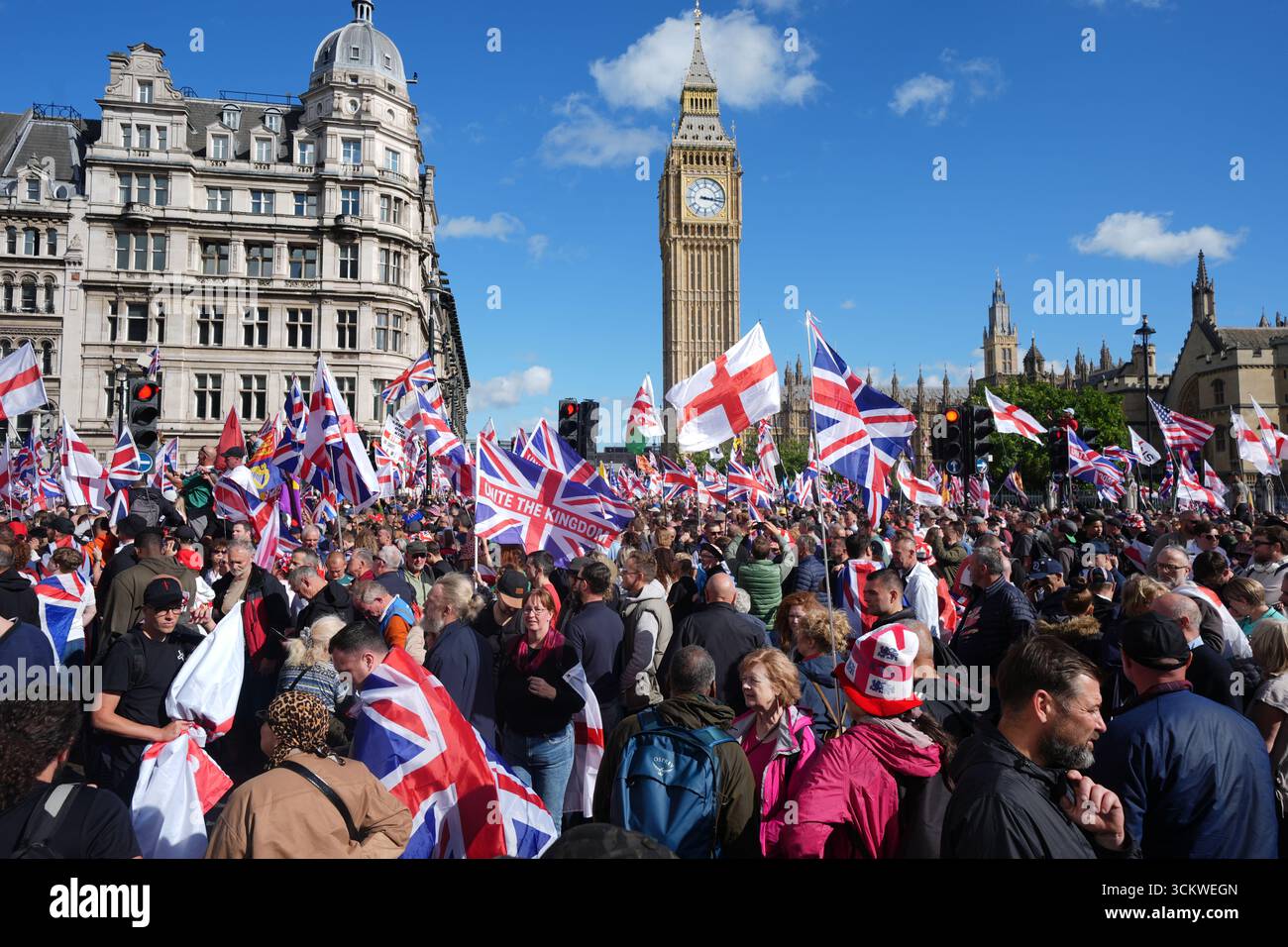 People taking part in a Tommy Robinson-led Unite the Kingdom march and ...