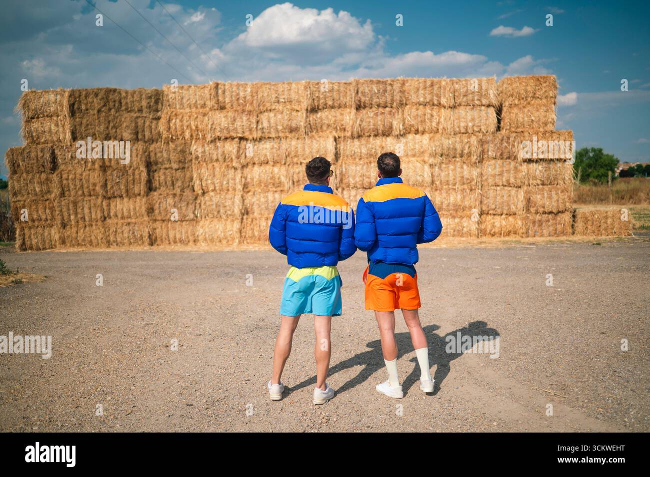 Backs facing hi-res stock photography and images - Alamy