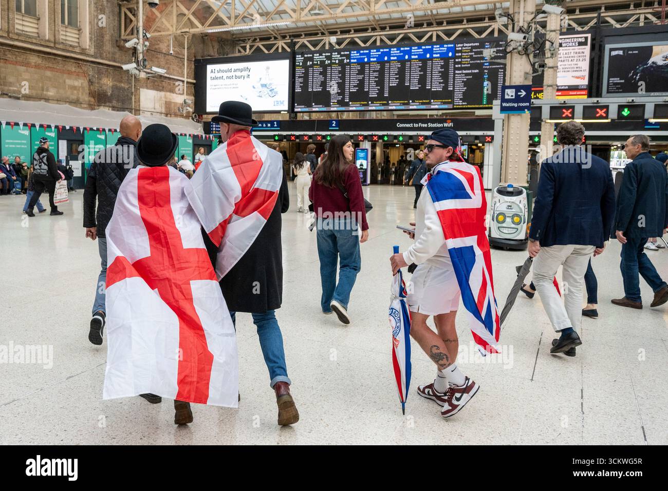 London, UK. 13 September 2025. Flag wearers in Charing Cross station as ...