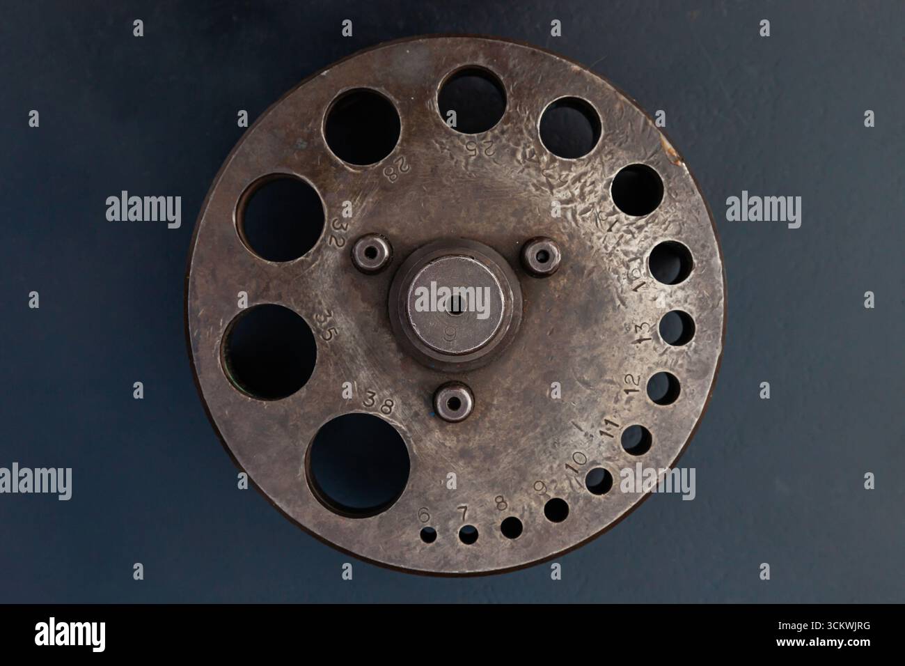 Industrial tool for punching holes in rubber and punching holes of ...