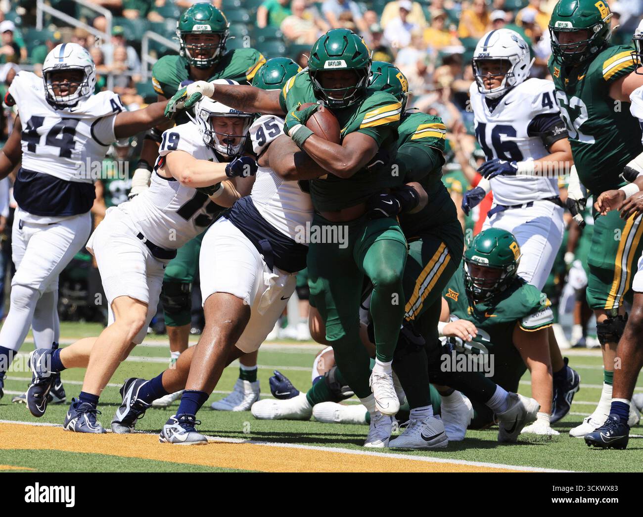 Baylor's running back Bryson Washington scores past Samford's defensive ...