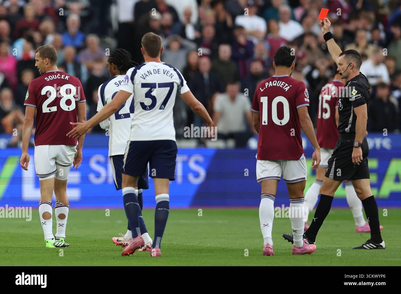 Referee Jarred Gillett shows West Ham United's Tomas Soucek a red card ...