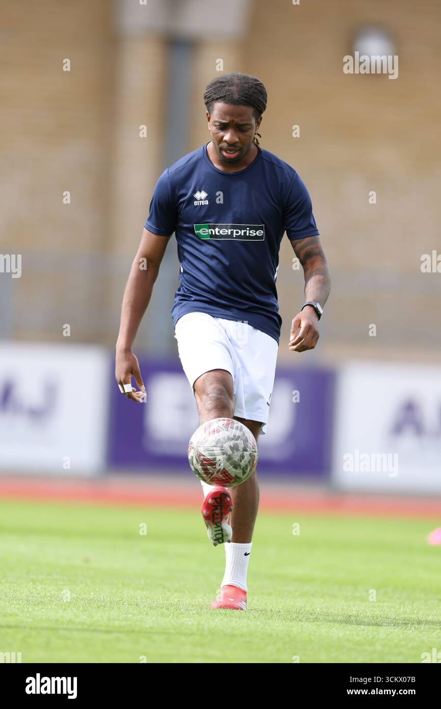 Dom Odusanya, of Chelmsford City, warming up before the match between ...