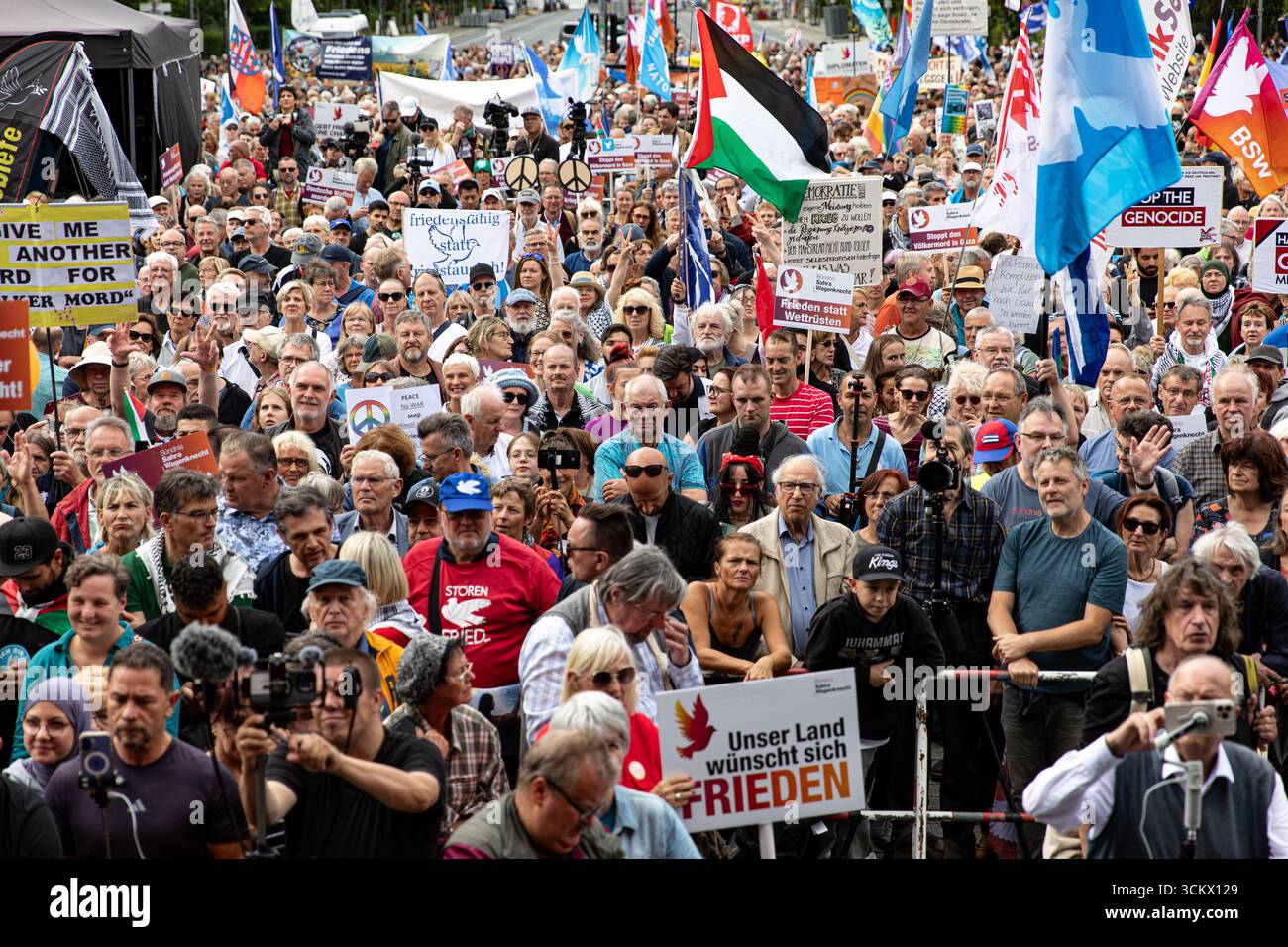 At least 12,000 people gathered at Berlin's Brandenburg Gate on ...