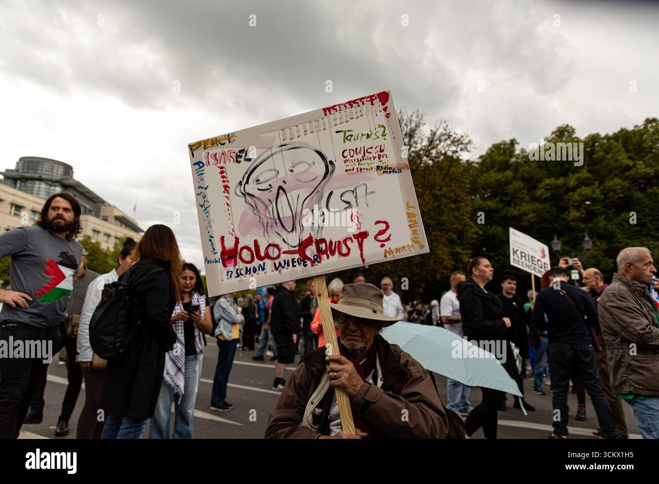 At least 12,000 people gathered at Berlin's Brandenburg Gate on ...