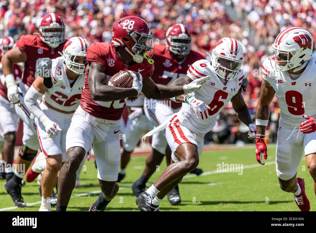 Alabama running back Kevin Riley (28) faces off against Wisconsin cornerback Omillio Agard (6 ...