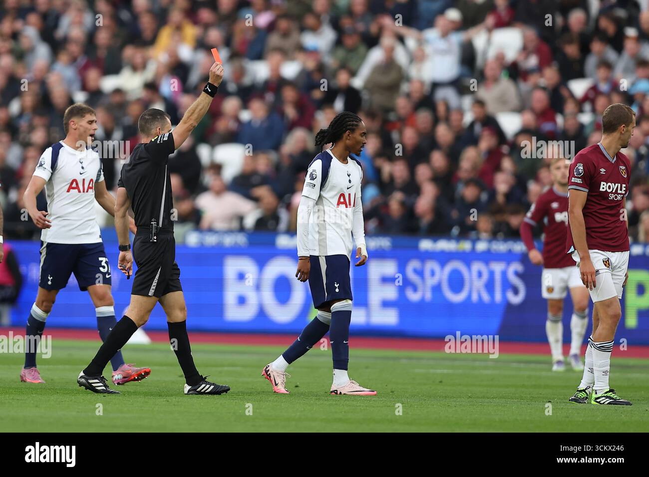 London, UK. 13th Sep, 2025. Tomas Soucek of West Ham United receives a ...
