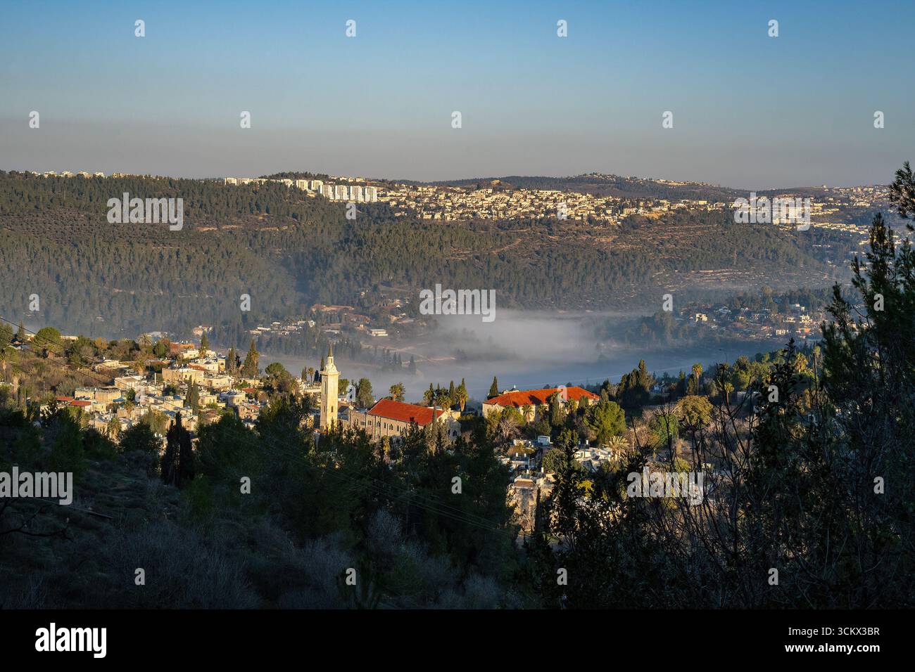 Early morning mist in the valley below the picturesque Ein Karem ...