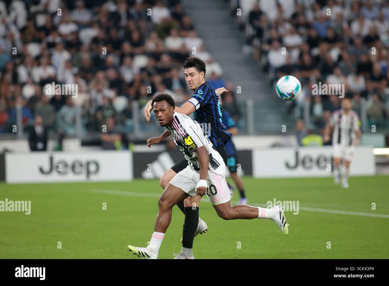 Lois Openda of Juventus FC and Alessandro Bastoni of FC Inter during ...