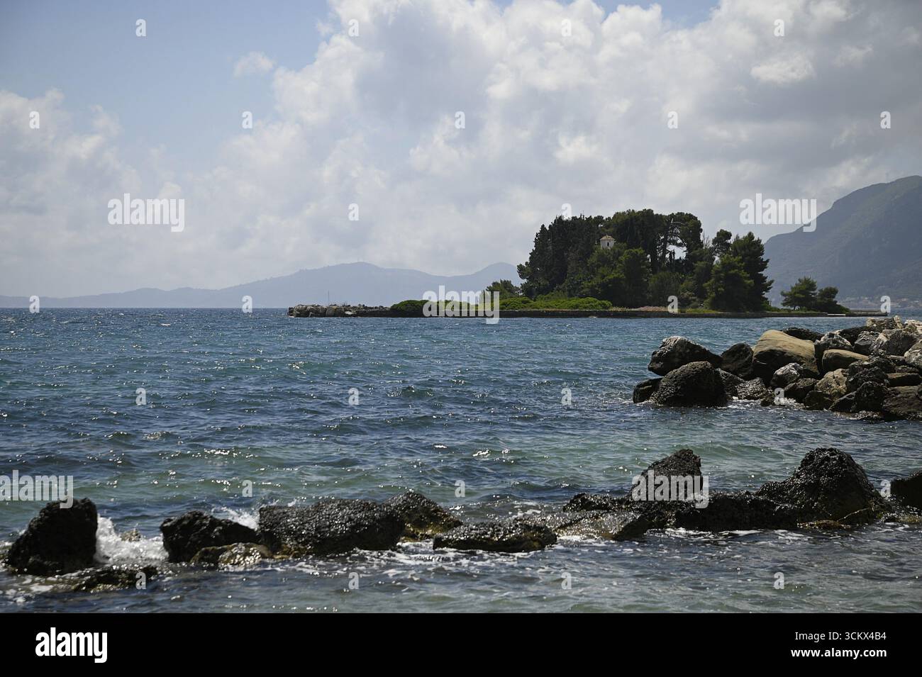 Seascape with scenic view of Pontikonisi a Greek islet as seen from the ...
