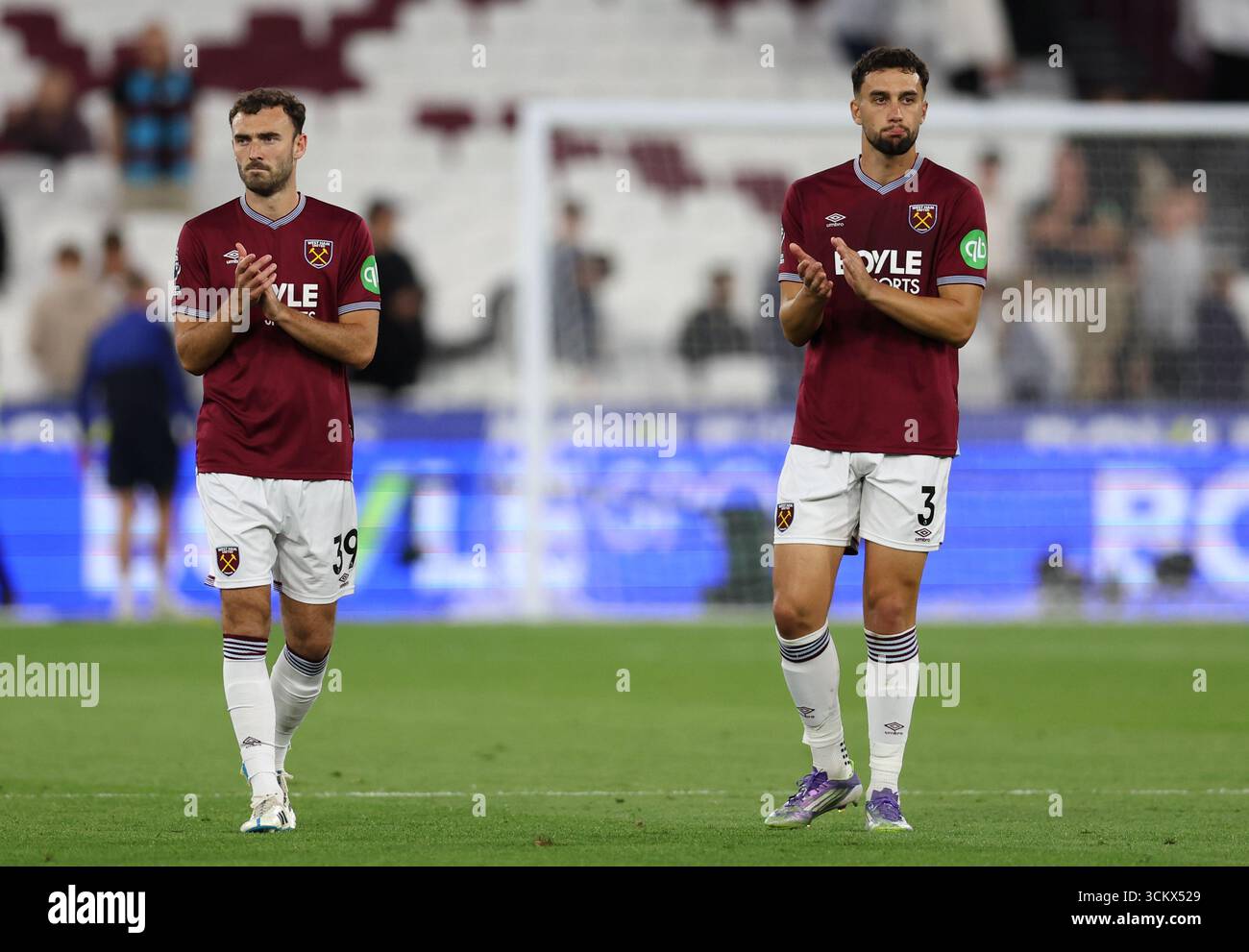 West Ham United's Andy Irving (left) and Max Kilman appear dejected ...