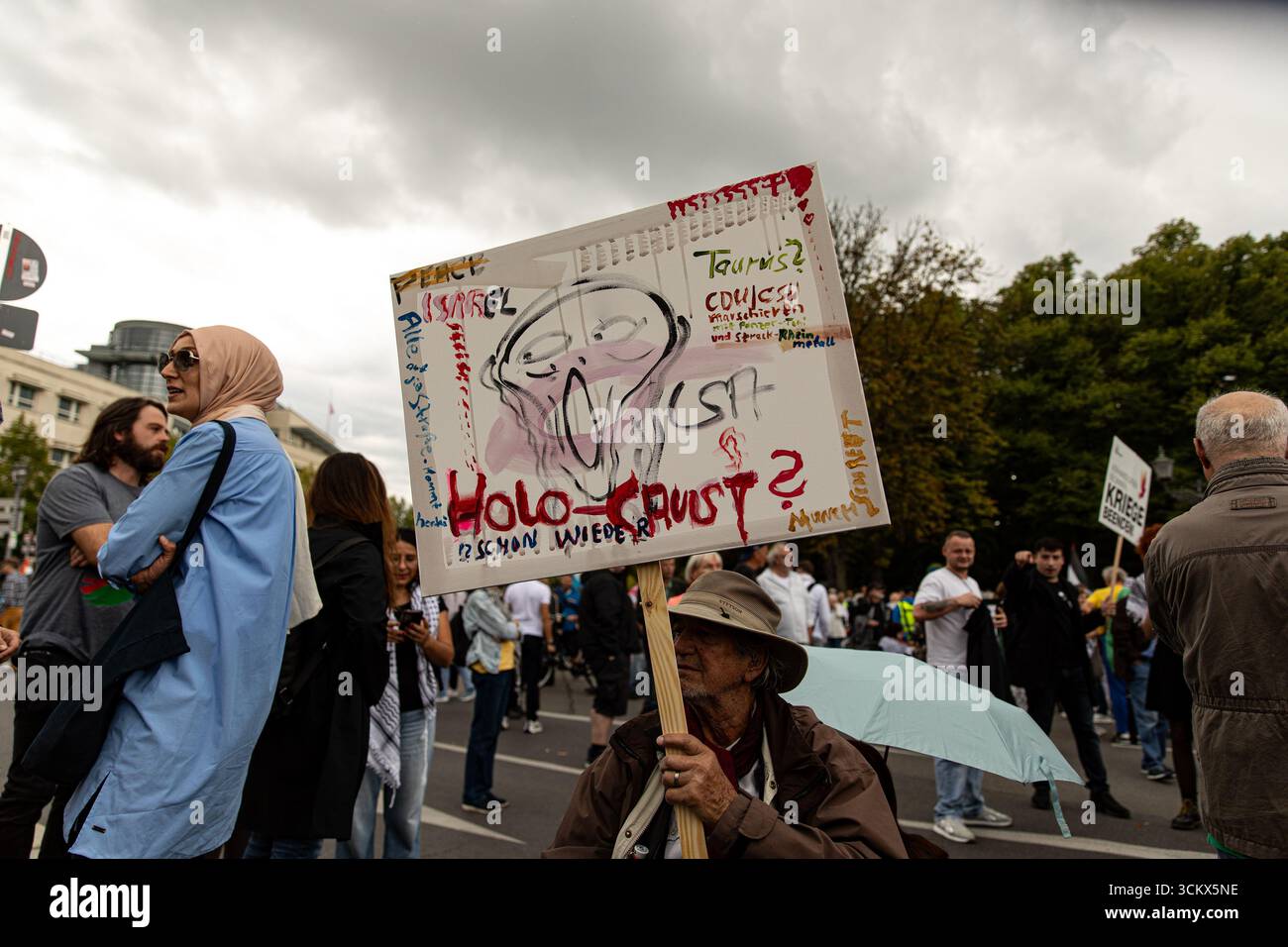 At least 12,000 people gathered at Berlin's Brandenburg Gate on ...