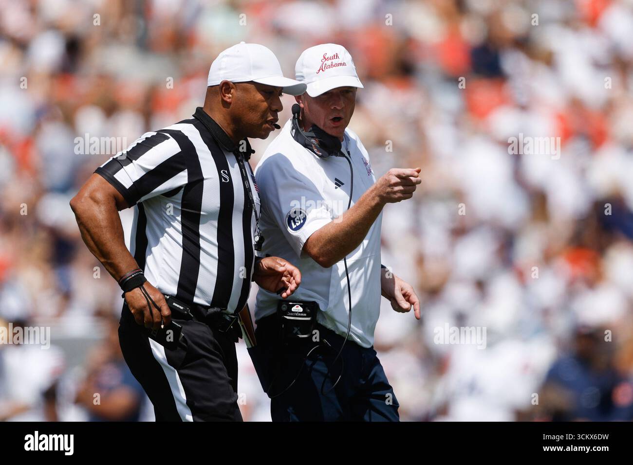 South Alabama head coach Major Applewhite talks with an official during ...