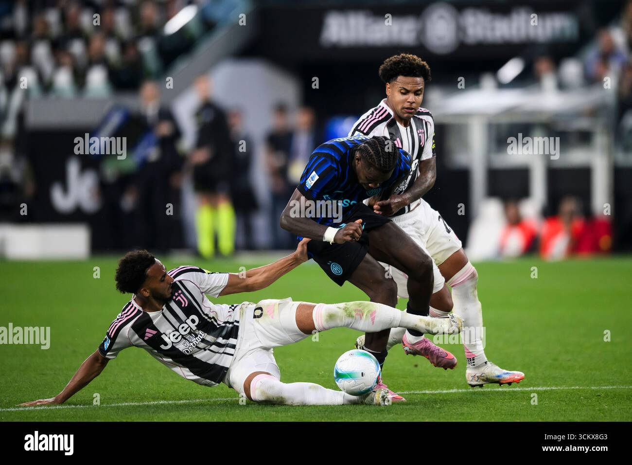 Marcus Thuram of FC Internazionale competes for the ball with Lloyd ...