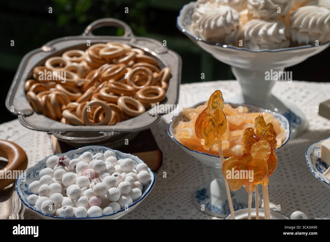 Traditional Russian sweets including rooster lollipops, baranki, zephyr ...