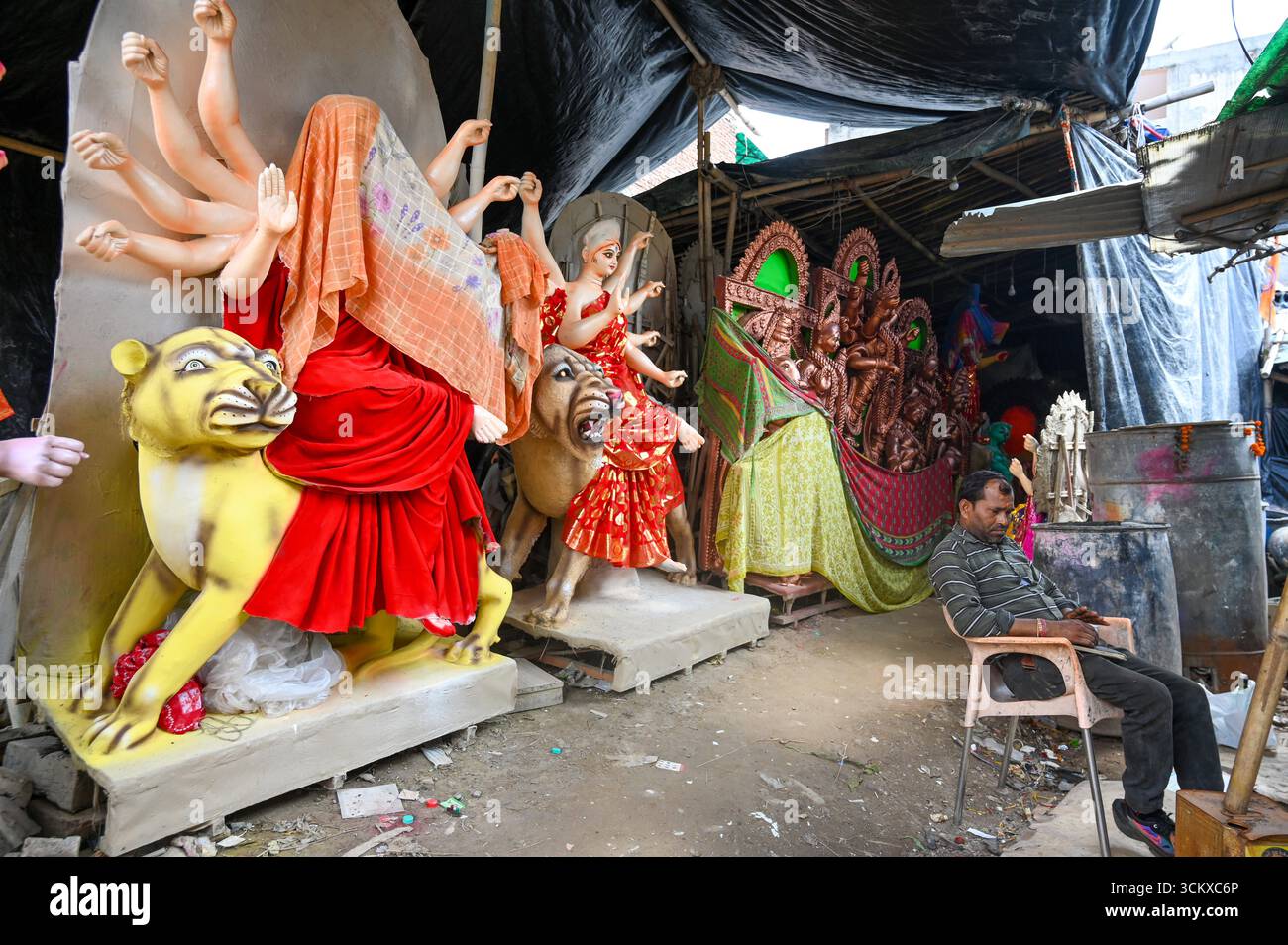 NOIDA, INDIA - SEPTEMBER 13: The artist created idols of Hindu goddess Durga, Goddess Lakshmi ...