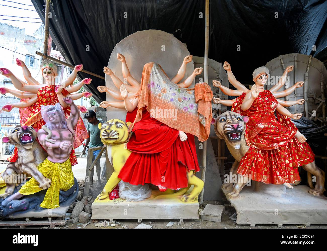 NOIDA, INDIA - SEPTEMBER 13: The artist created idols of Hindu goddess Durga, Goddess Lakshmi ...