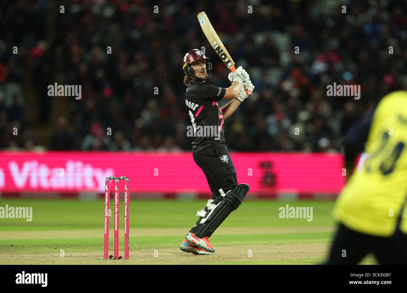 Somerset's Tom Kohler-Cadmore hits a six while batting during the ...