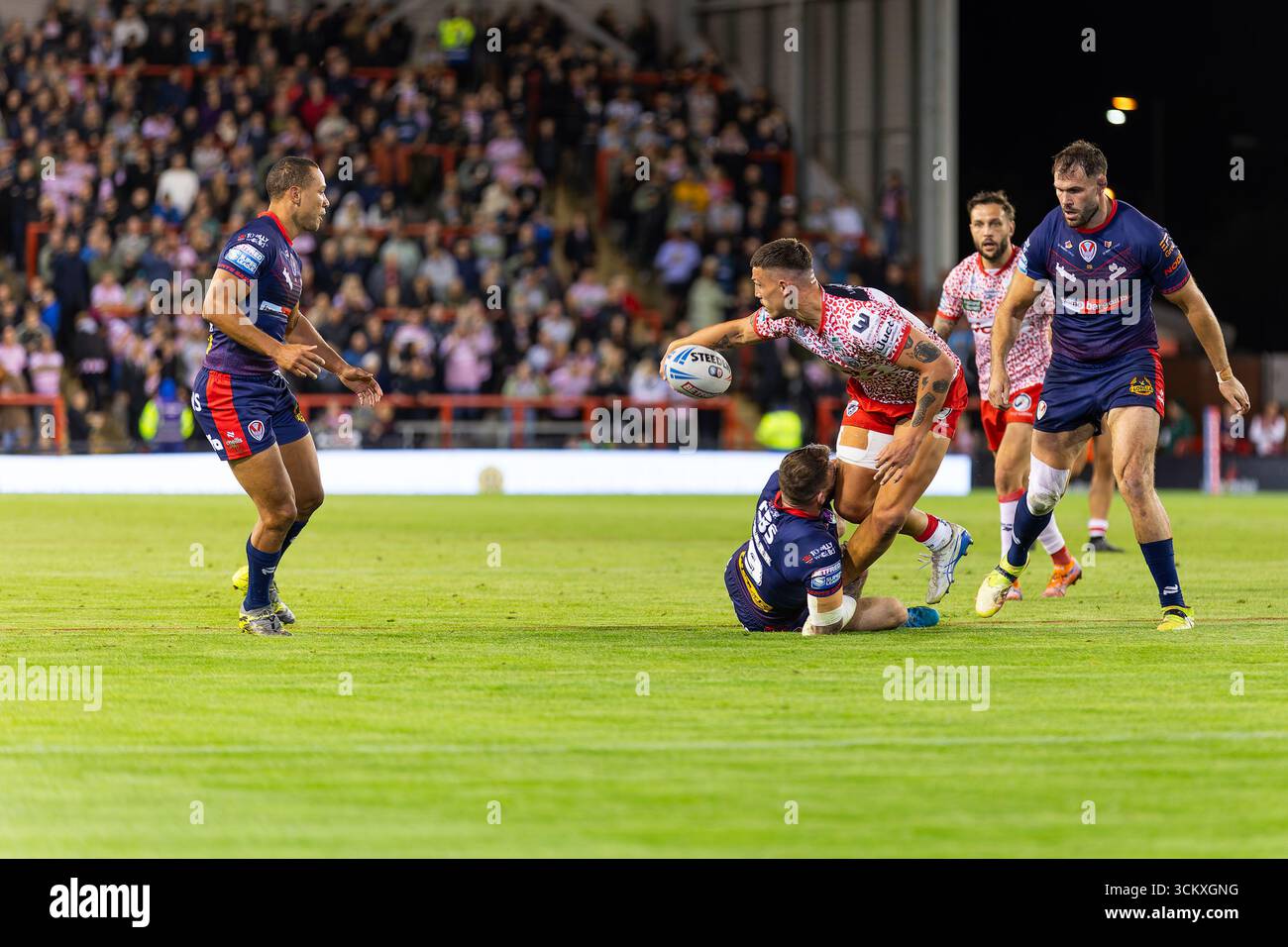 Keanan Brand of Leigh Leopards looks to offload during the Betfred ...