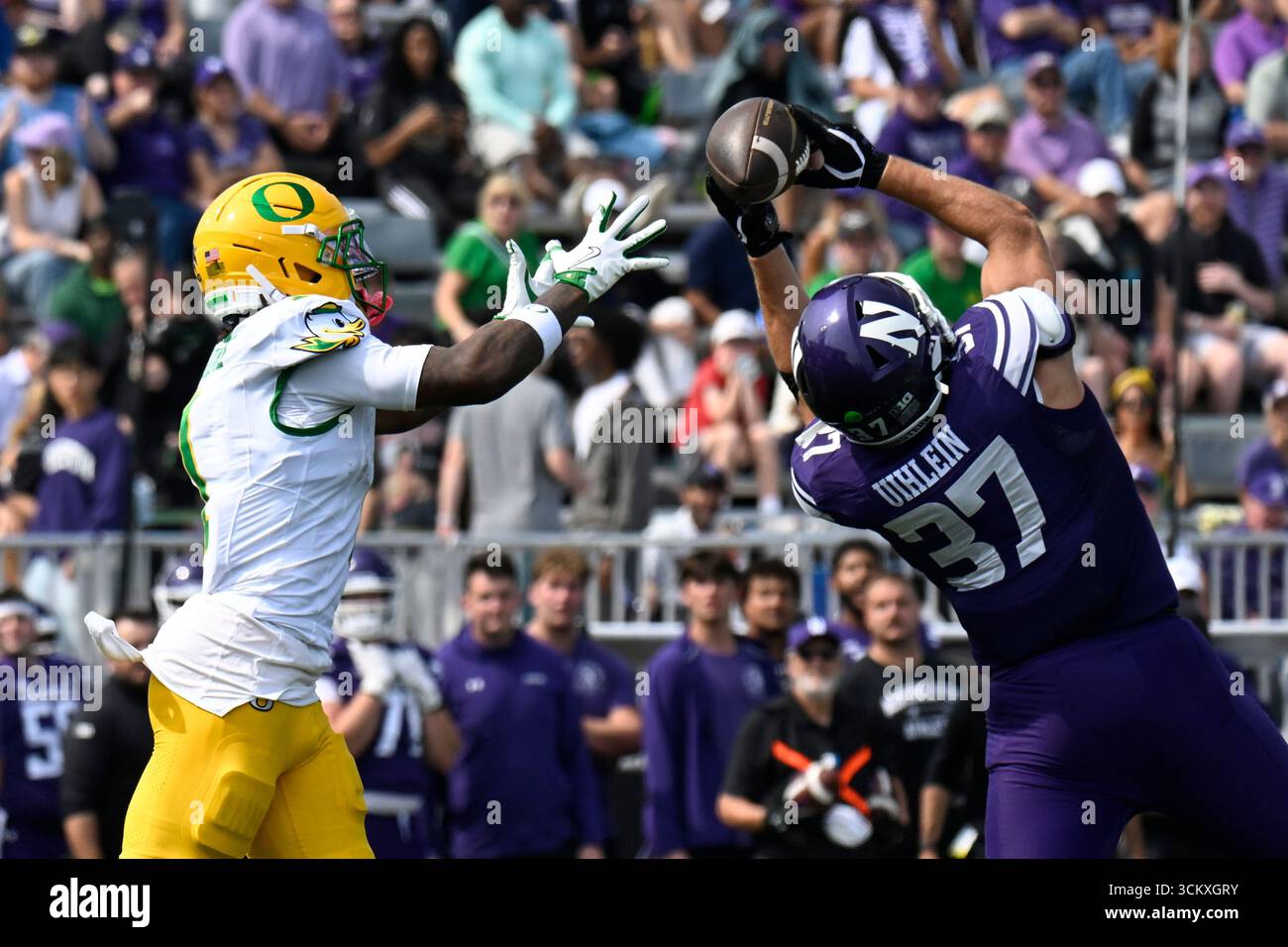 Northwestern linebacker Mac Uihlein (37) grabs an interception intended ...