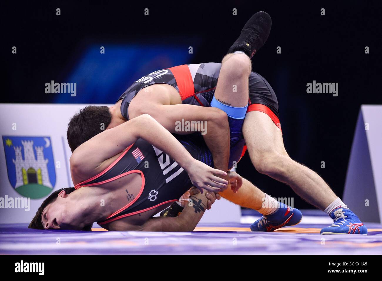 ZAGREB, CROATIA - SEPTEMBER 13: Zavur Uguev, UWW (red) competes against ...