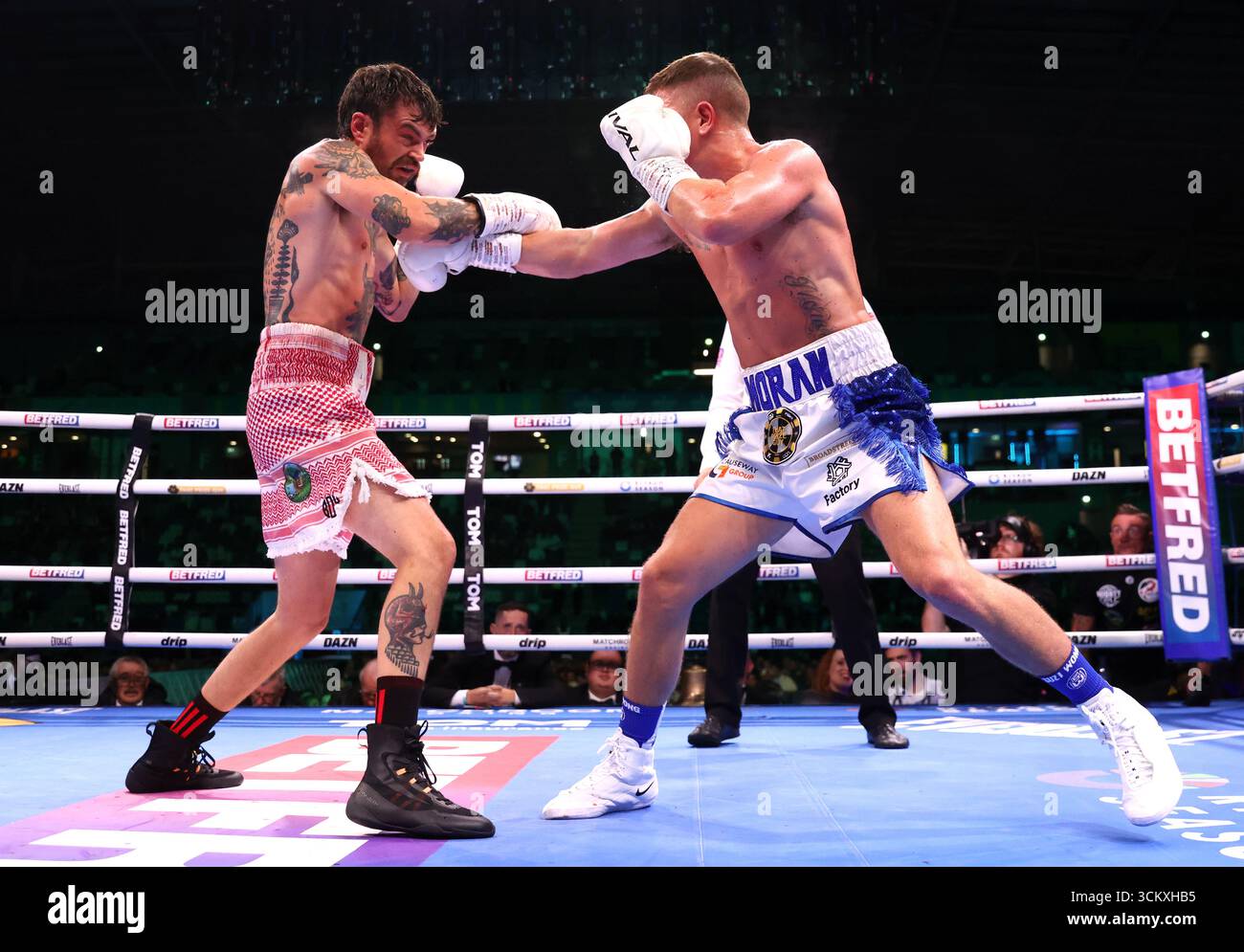 Tyrone McKenna (left) and Dylan Moran in the welter weight bout at the ...