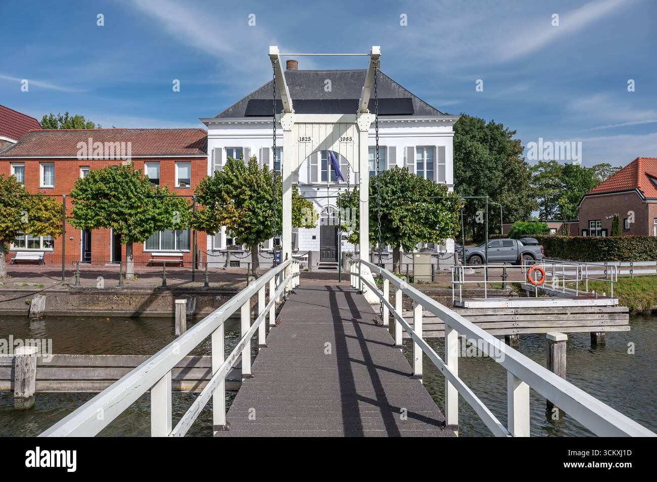 De witte Ophaalbrug, a historical bridge over the canal in Sas Van Gent ...