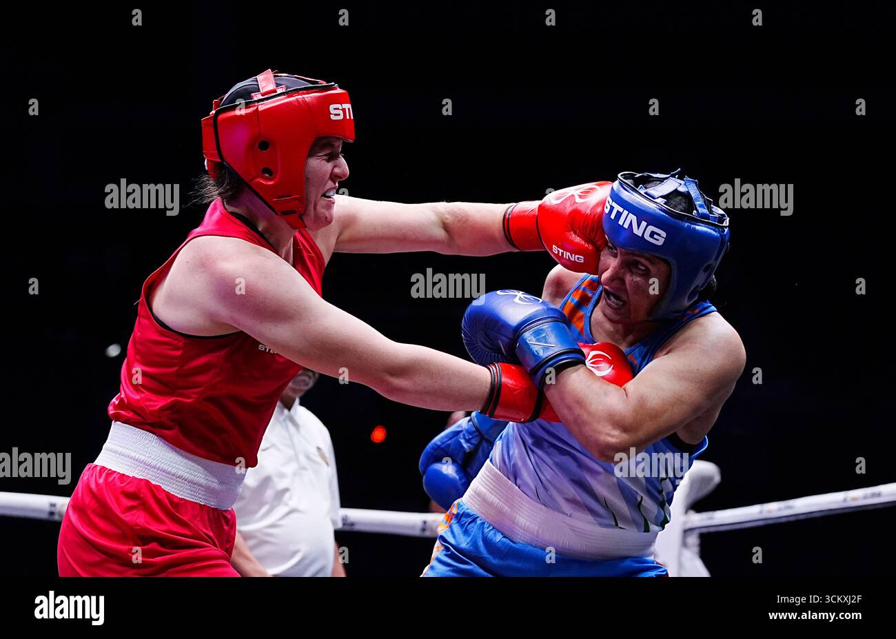 Emily Asquith (left) in action against Pooja Rani (right) on day ten of ...