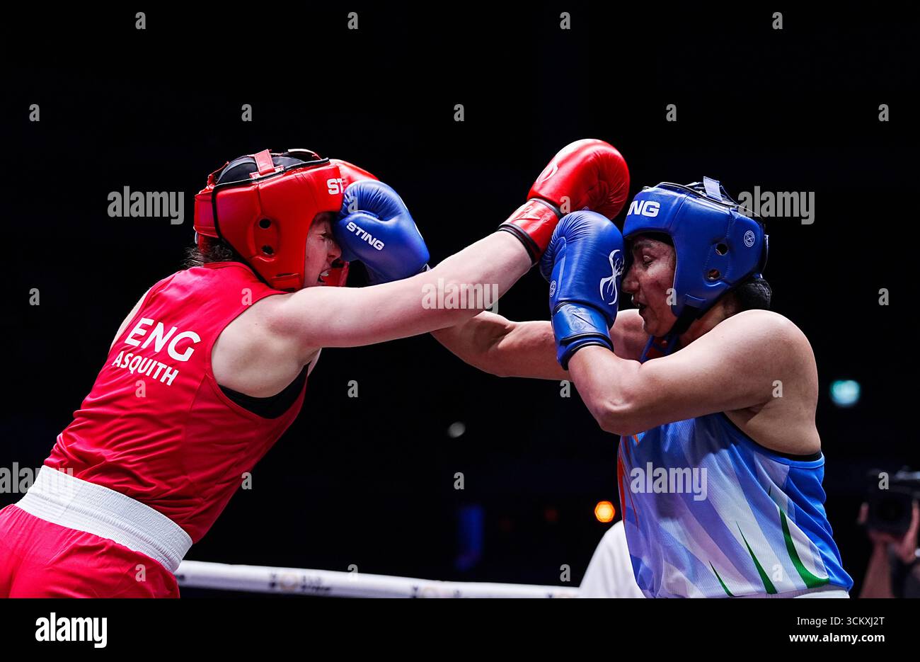 Emily Asquith (left) in action against Pooja Rani (right) on day ten of ...