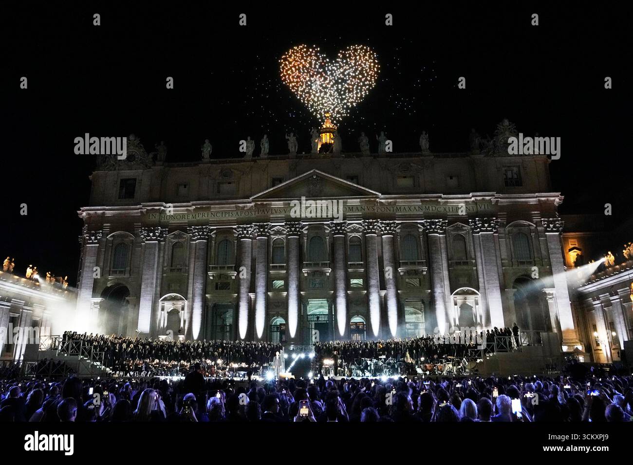 Drones compose light images over St. Peter basilica during a concert in ...