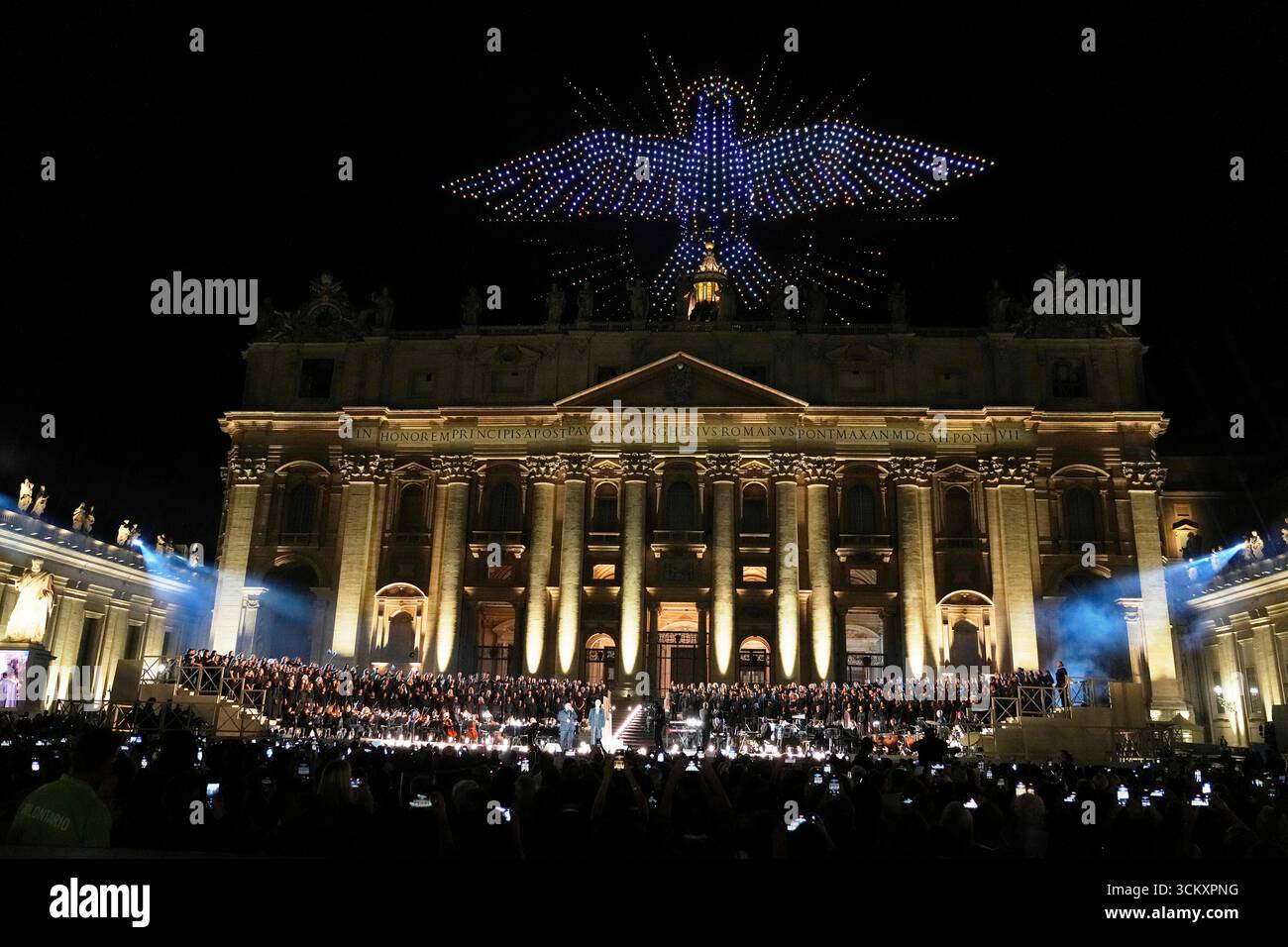 Drones compose light images over St. Peter basilica during a concert in ...