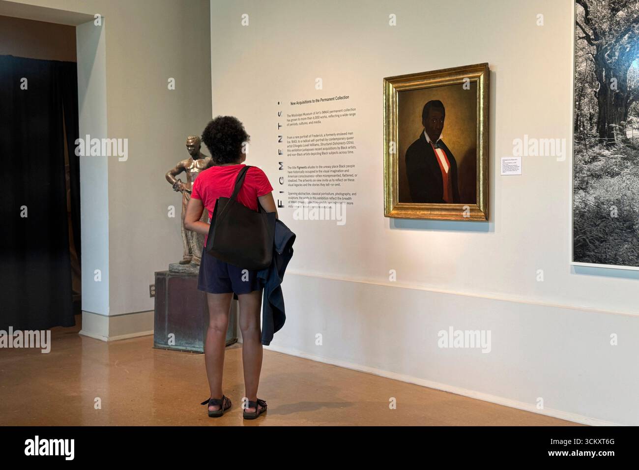 Staci Williams looks at the painting "Portrait of Frederick" at the ...