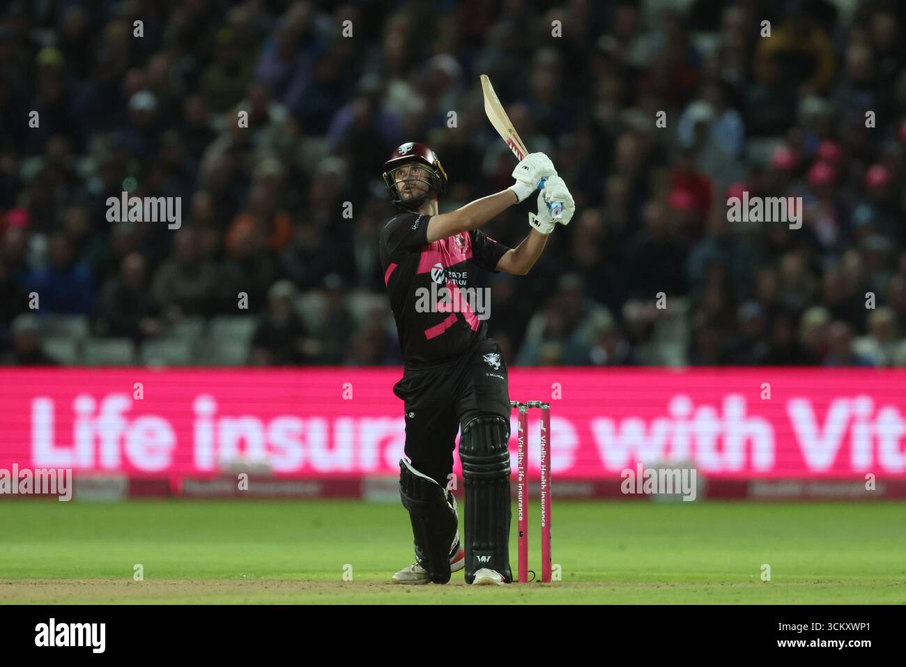 Somerset's Lewis Gregory hits a six while batting during the Vitality ...