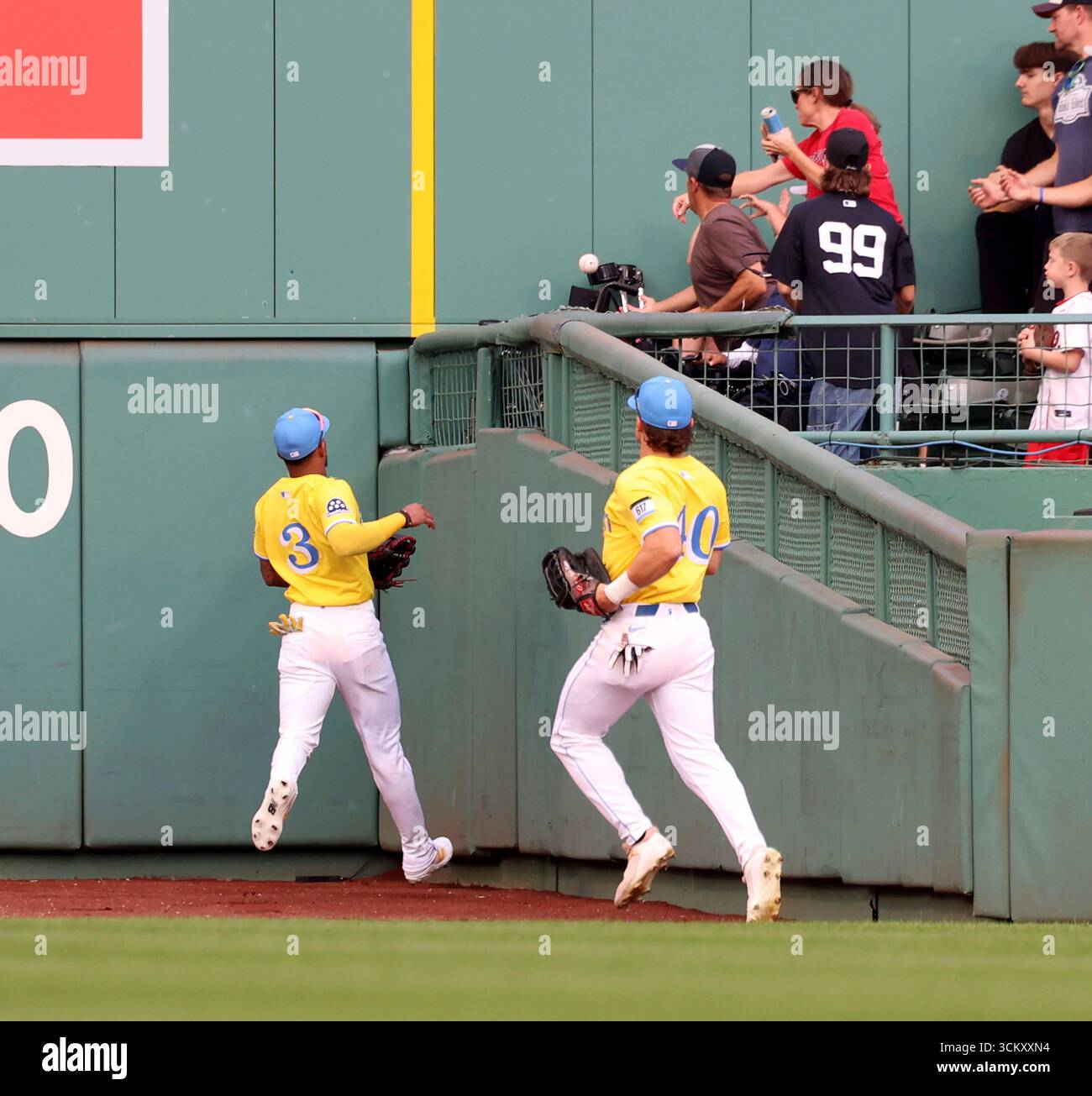 Boston Red Sox outfielders Ceddanne Rafaela (3) and Nate Eaton (40 ...