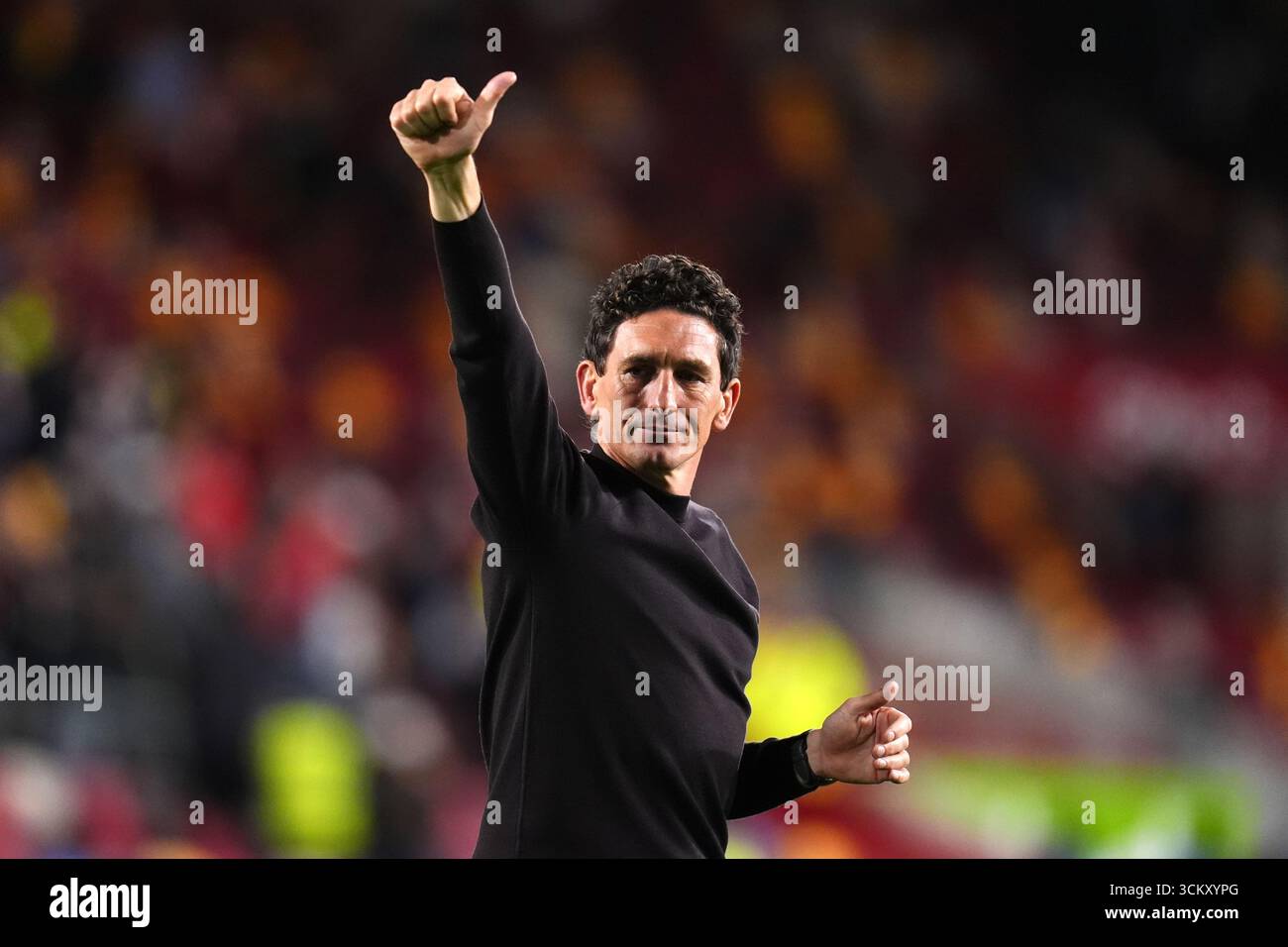 Brentford manager Keith Andrews salutes the fans following the Premier ...