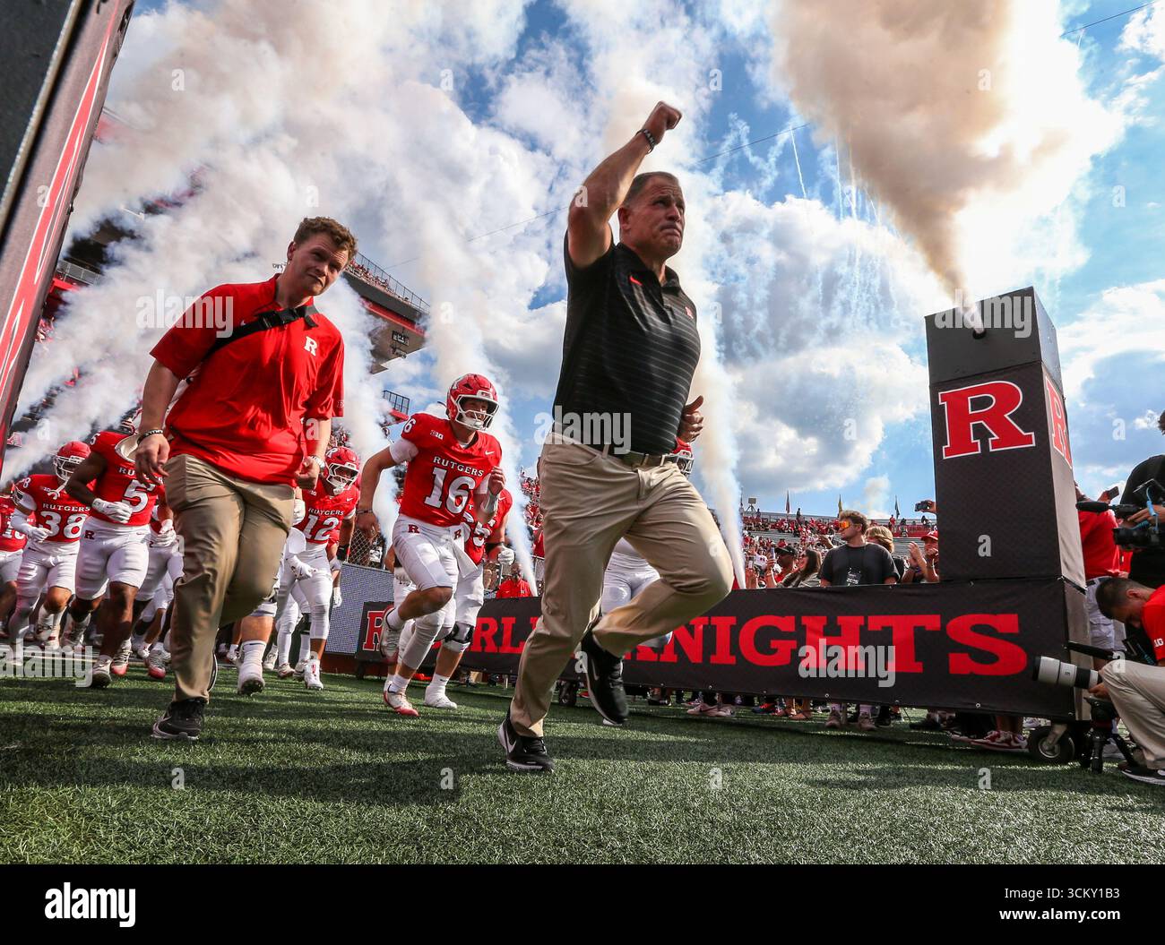 September 13, 2025: Rutgers head coach Greg Schiano leads the team onto ...