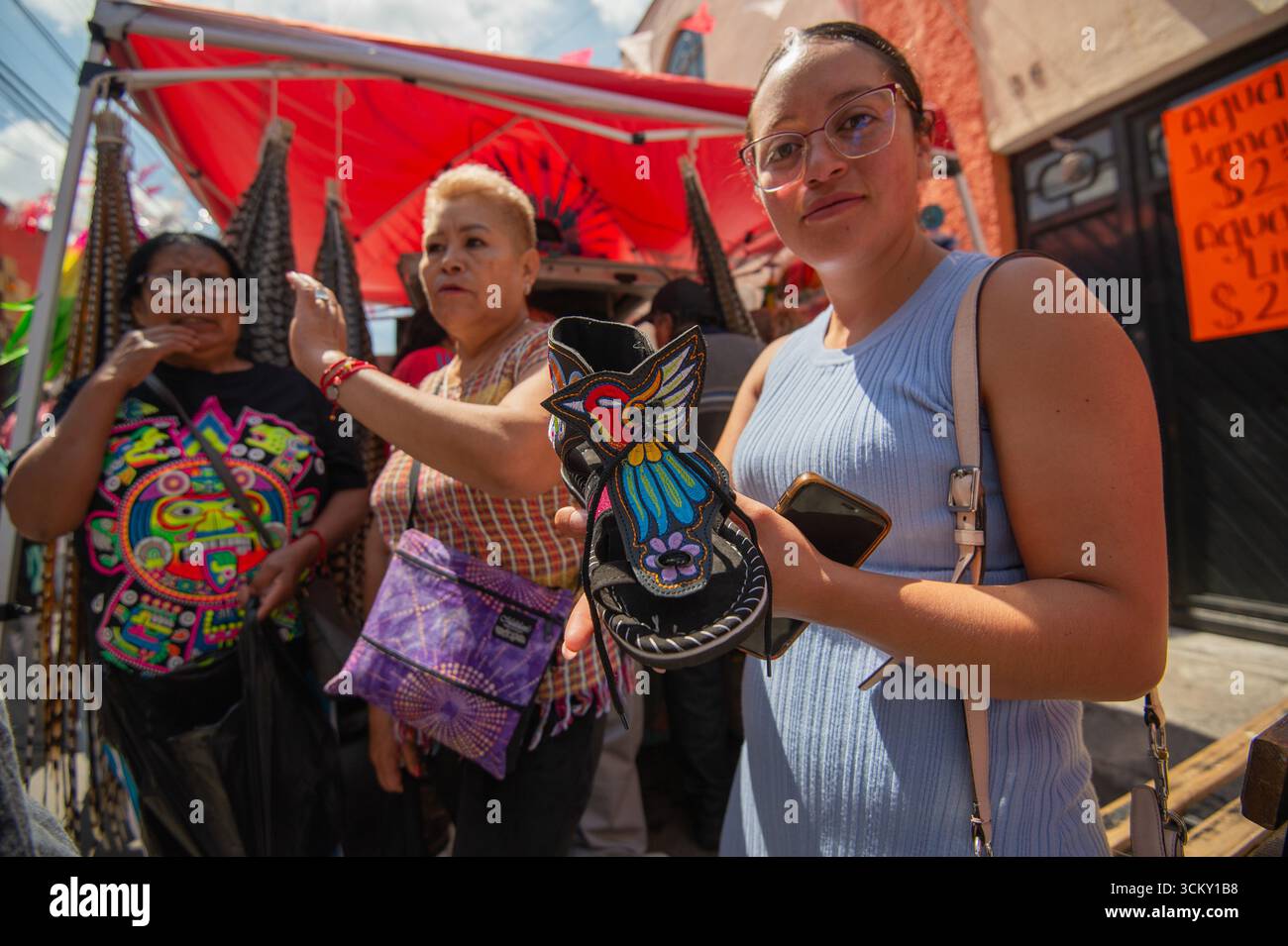 People arrive at the San Francisquito neighborhood near the Temple of ...